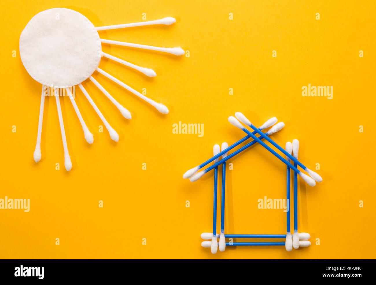 The symbol of a house made of blue sticks Stock Photo - Alamy