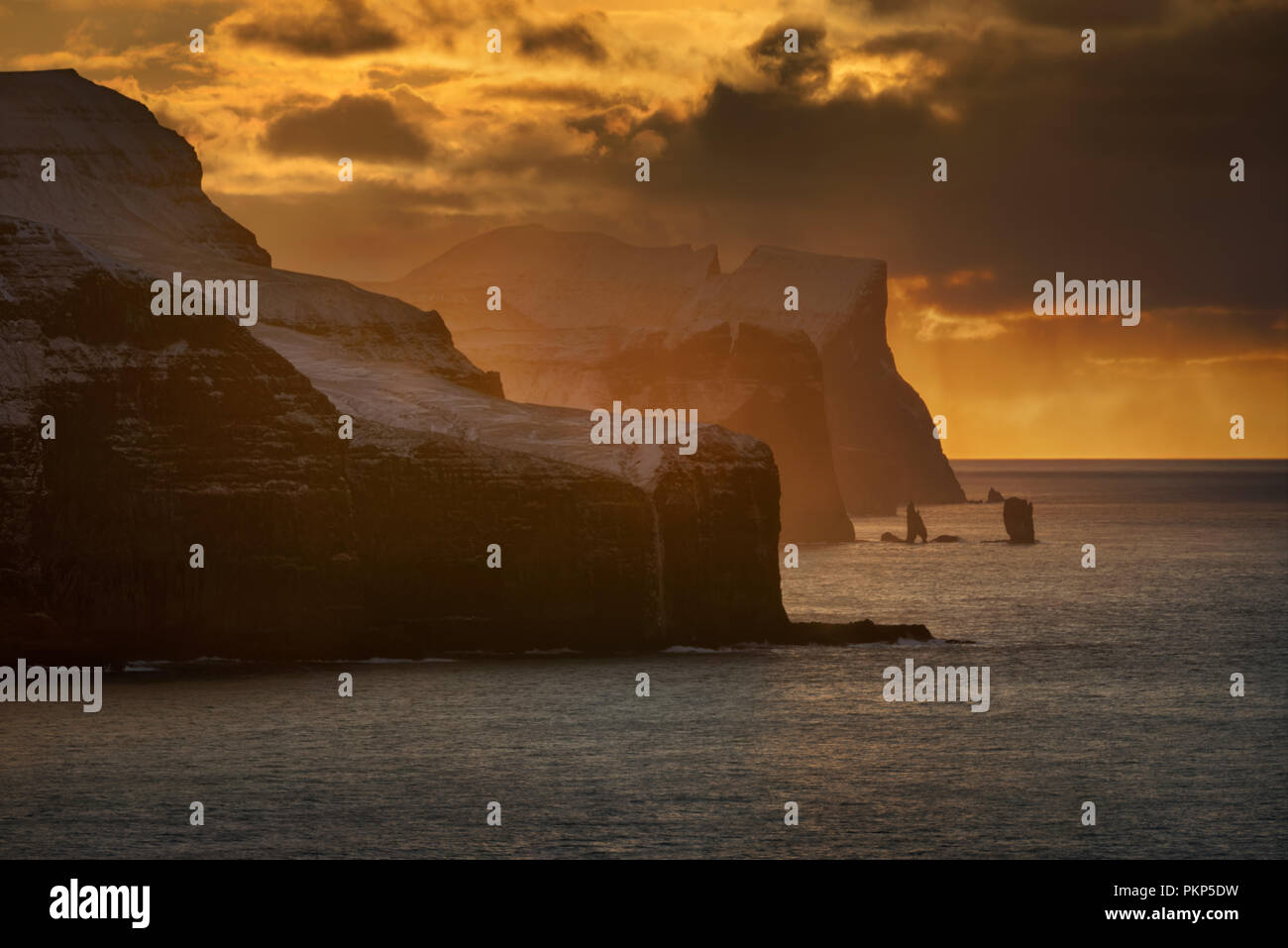 Streymoy and Eysturoy cliffs in sunset light, Faroe Islands Stock Photo ...