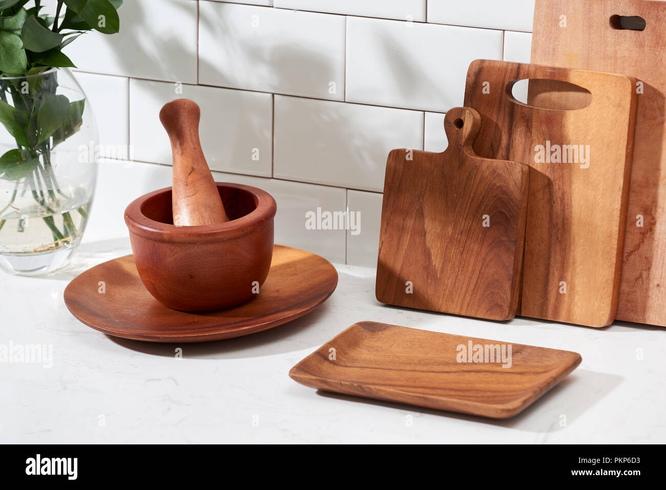 Still life with kitchen wooden utensils on white background Stock Photo ...