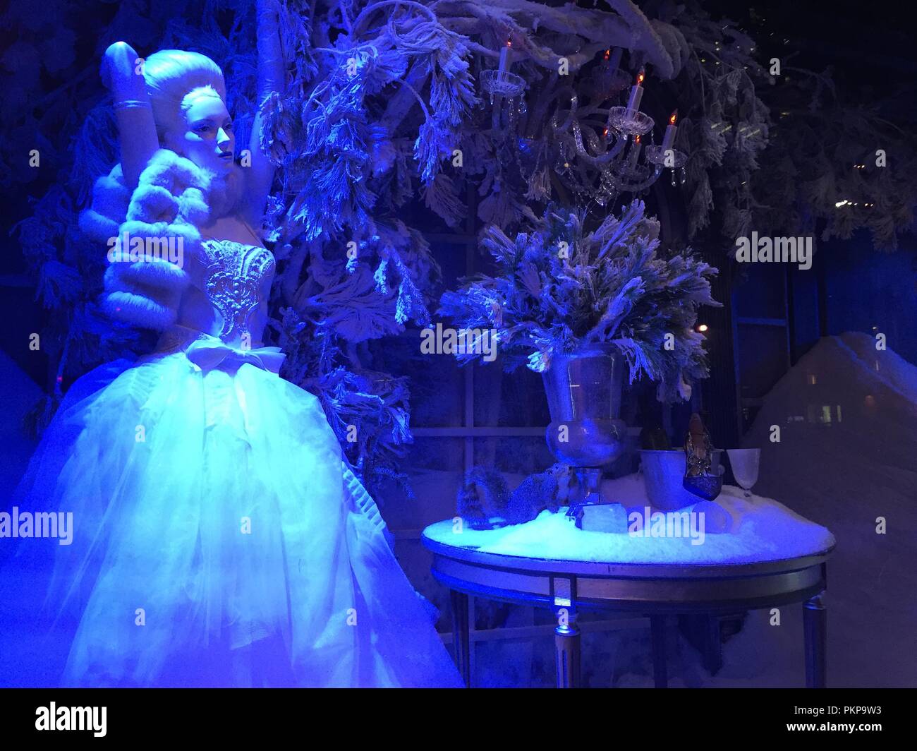 Spectators view holiday window display at Saks Fifth Avenue in NYC on ...