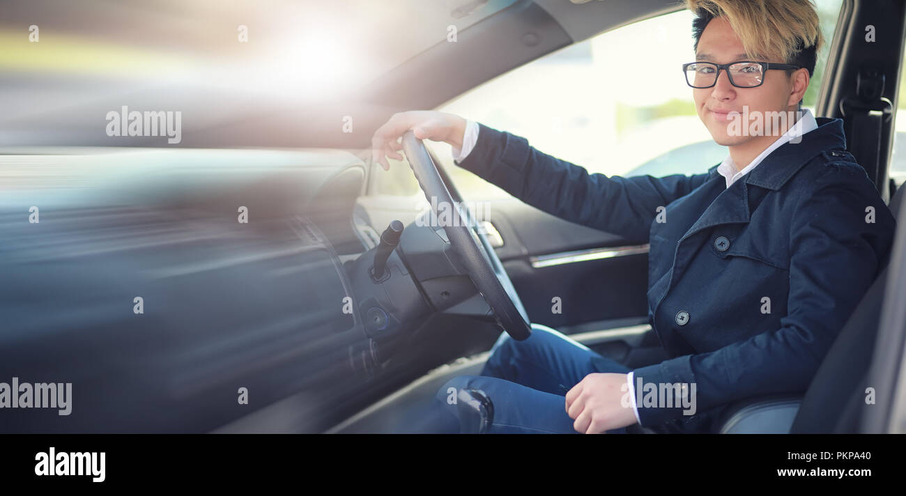 Man with car in the street Stock Photo - Alamy