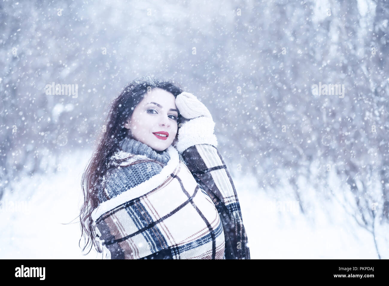 Beautiful girl in a beautiful winter snow Stock Photo - Alamy