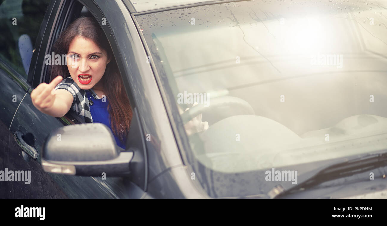 Girl driving a car bad emotions Stock Photo - Alamy