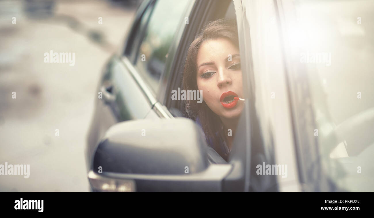 Girl driving a car bad emotions Stock Photo - Alamy