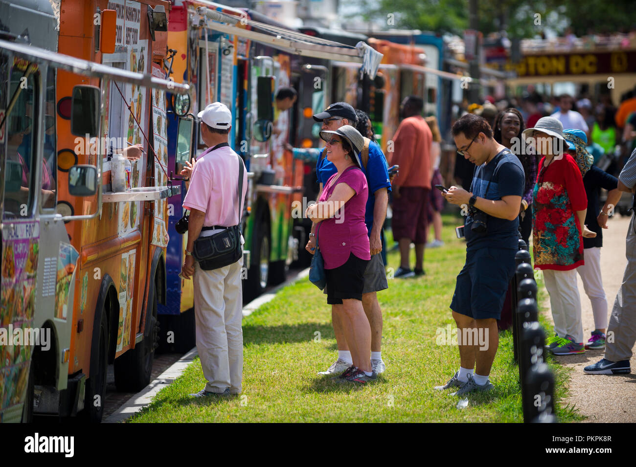 WASHINGTON DC - CIRCA AUGUST, 2018: Customers order from Food trucks ...