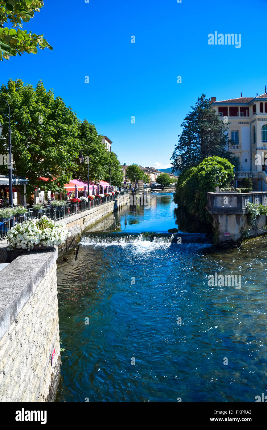 The lovely village of Isle Sur la Sorgue straddling the Sorgue RIver in ...