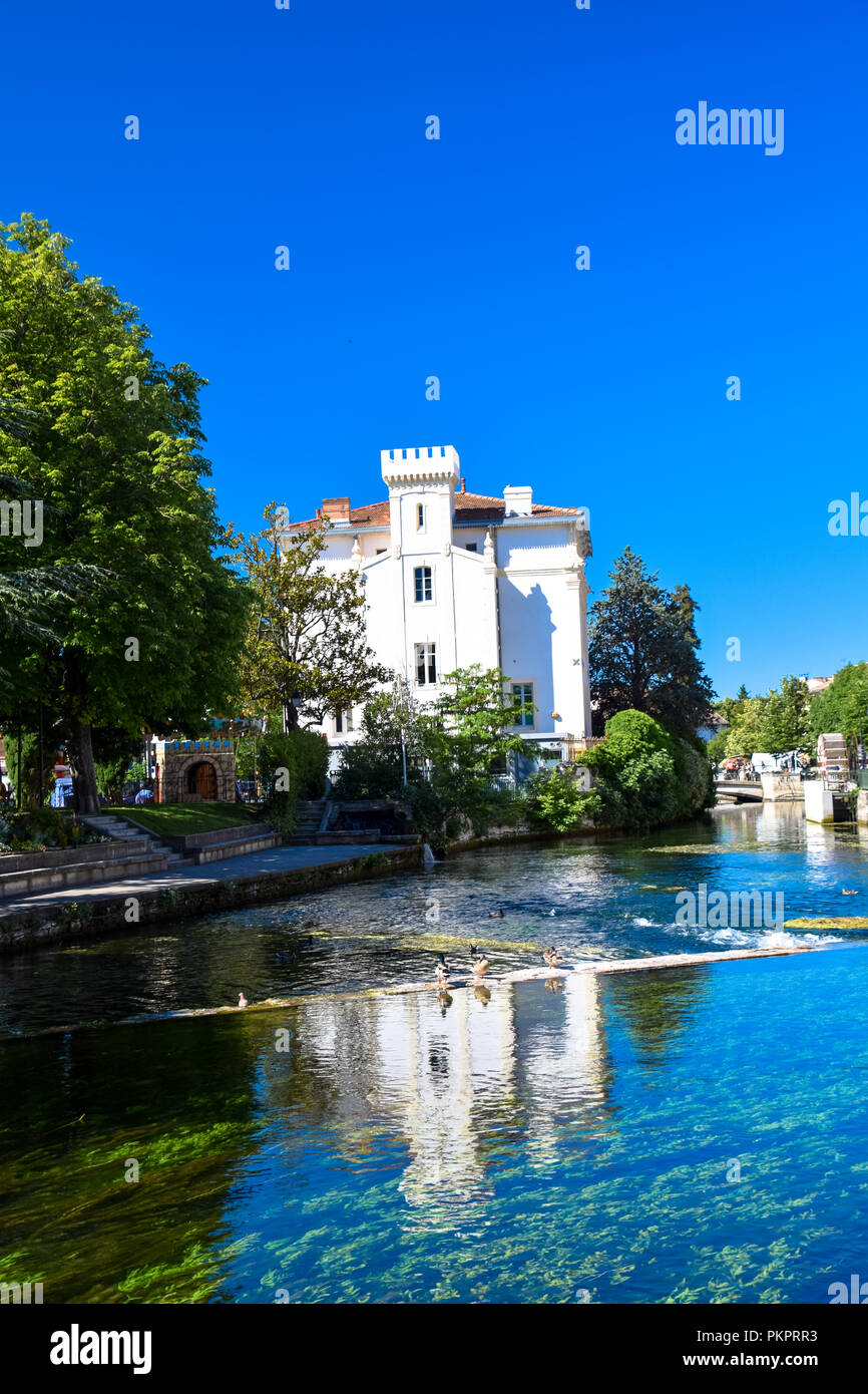 The lovely village of Isle Sur la Sorgue straddling the Sorgue RIver in ...