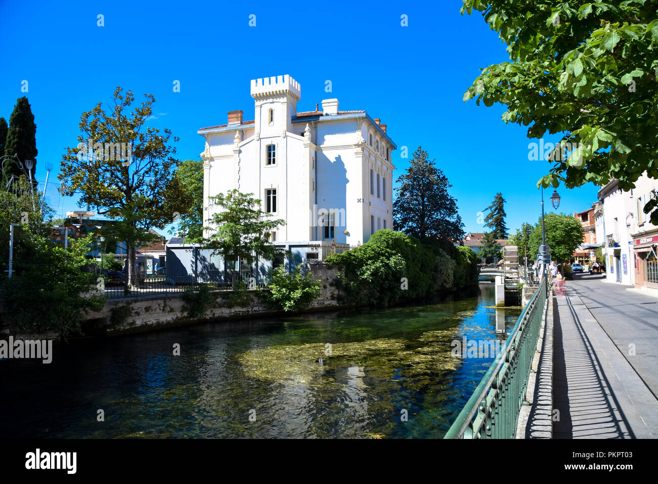 The lovely village of Isle Sur la Sorgue straddling the Sorgue RIver in ...