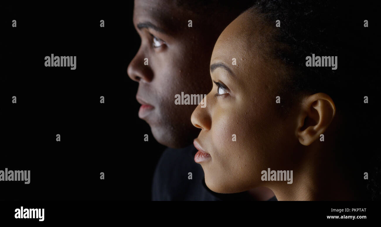Dramatic profile of Black man and woman looking up Stock Photo - Alamy