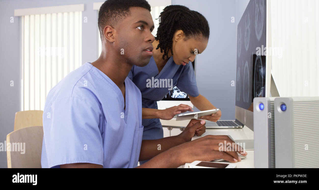 Two computer stations hi-res stock photography and images - Alamy