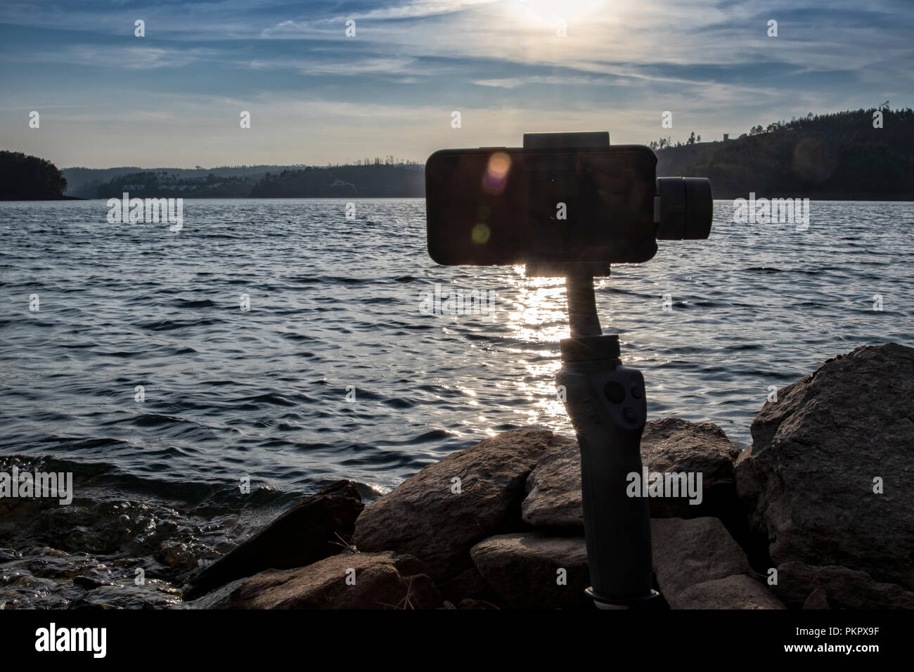Cell phone filming landscape with gimbal. Sunset on the Serra de Tomar ...