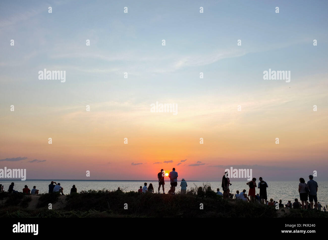 Group of people enjoying the sunset at Mindil Beach in Darwin, Northern ...