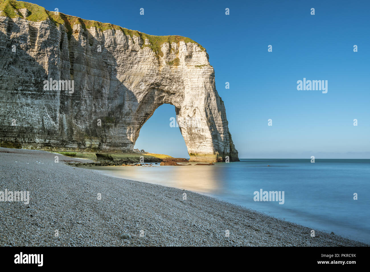 Chalk cliffs of Etretat (Normandy France) with the natural arch called ...
