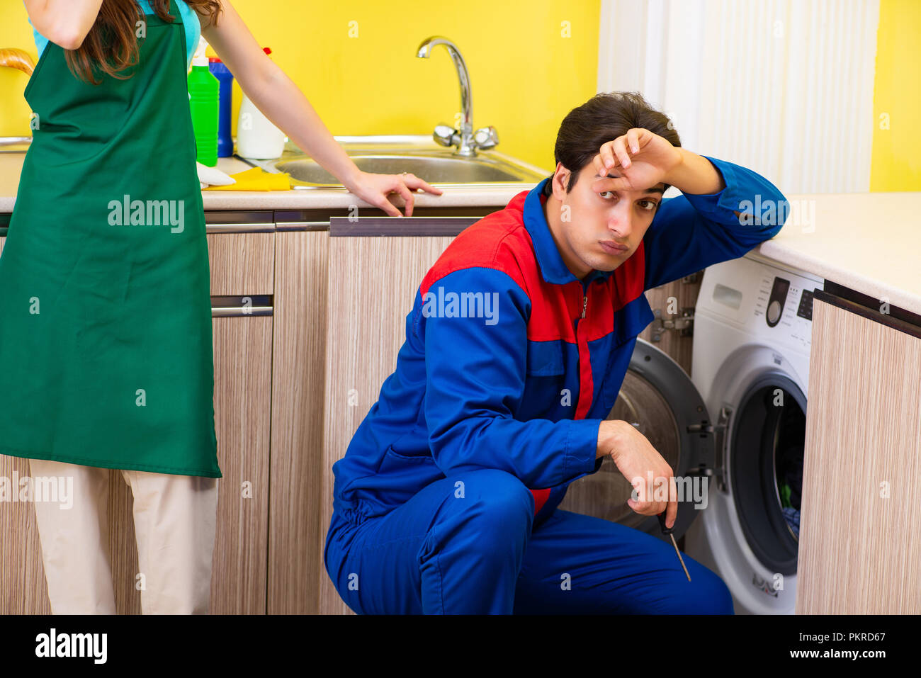 Woman washing machine defect hi-res stock photography and images - Alamy