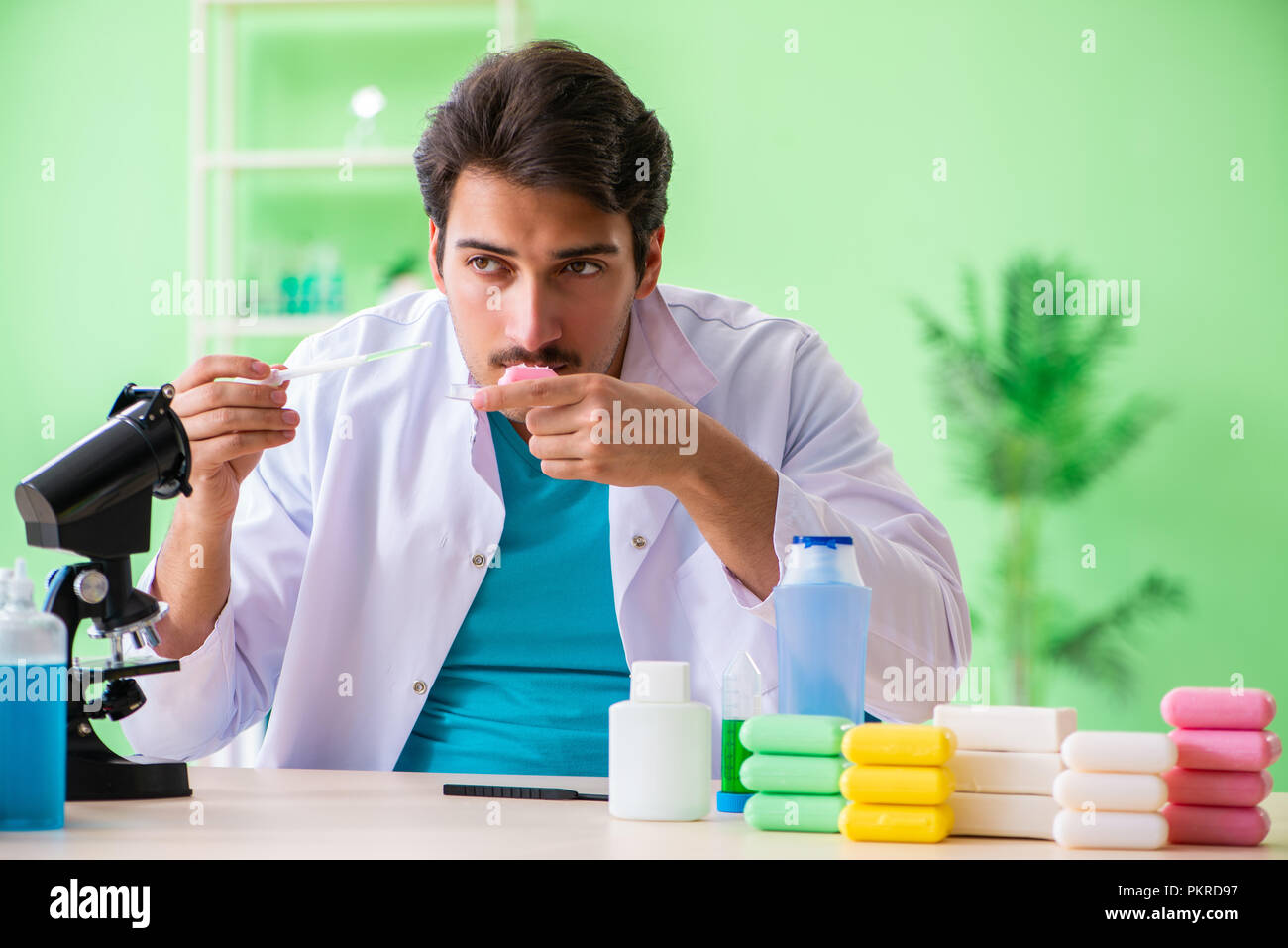 Chemist testing soap in the lab Stock Photo - Alamy