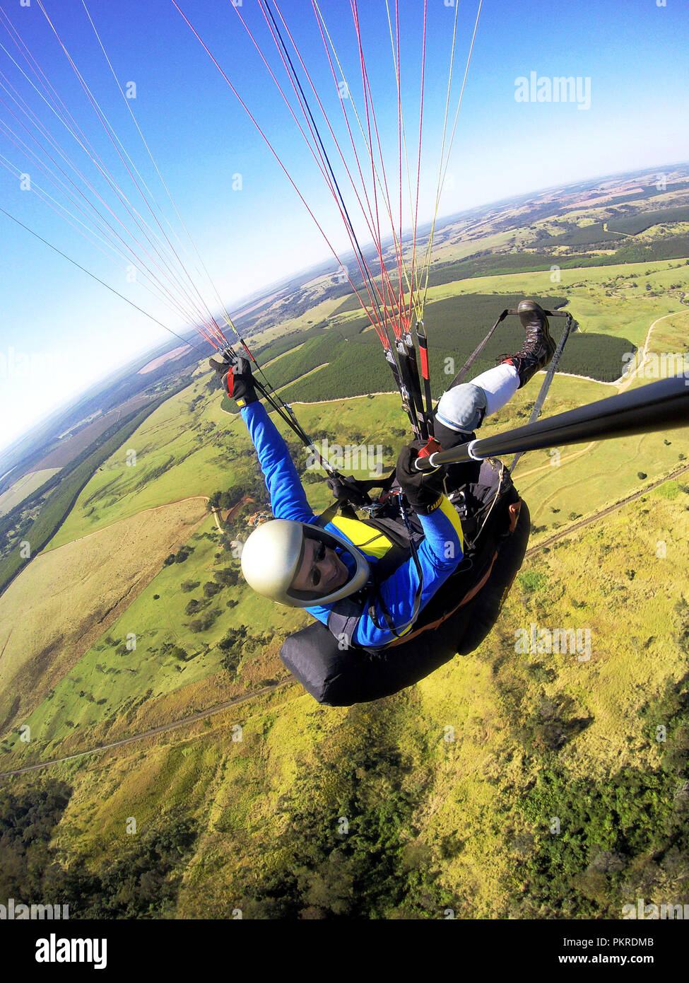 Paragliding pilot, physically handicapped Stock Photo - Alamy