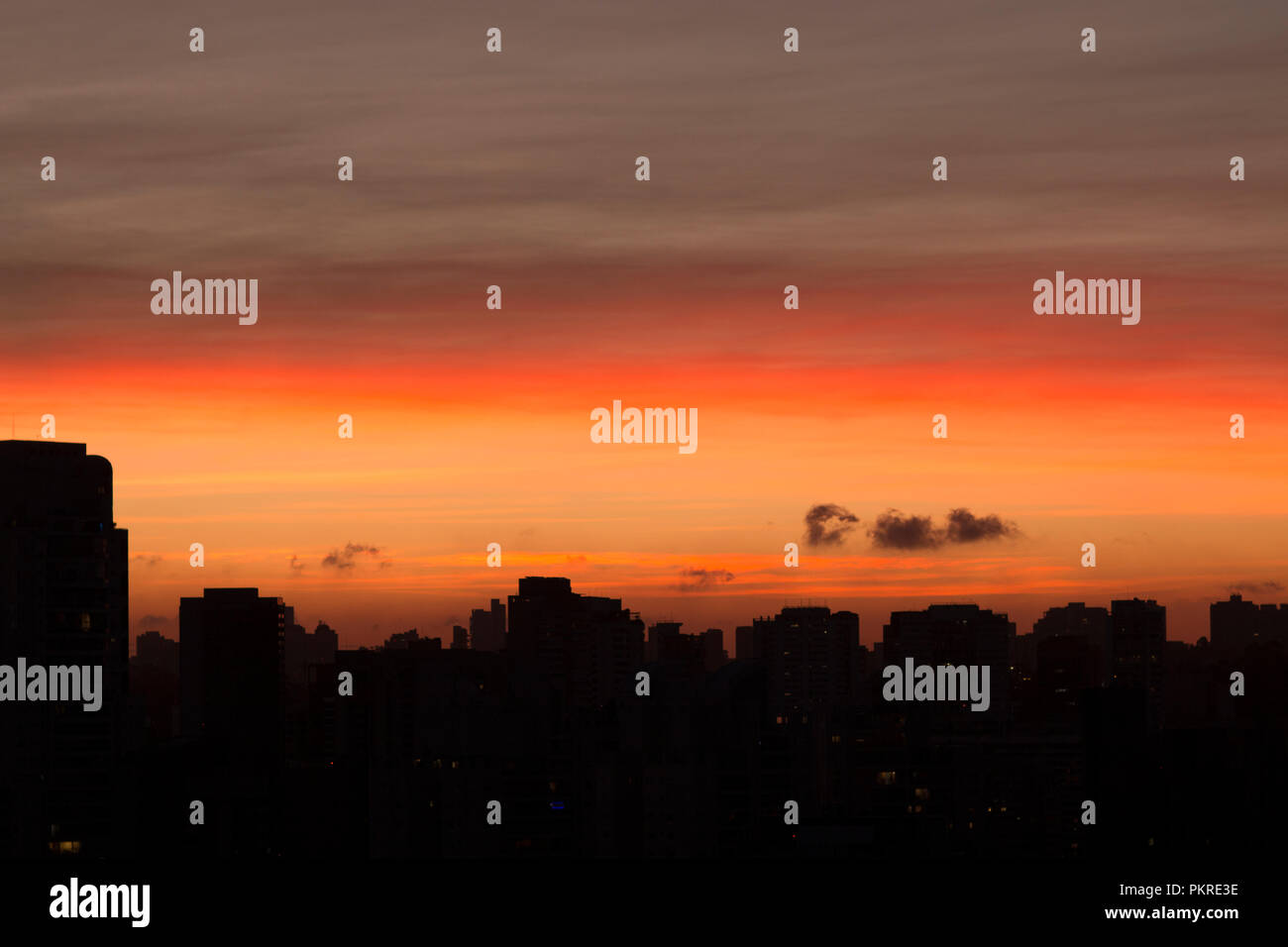 Sunrise between buildings Stock Photo - Alamy