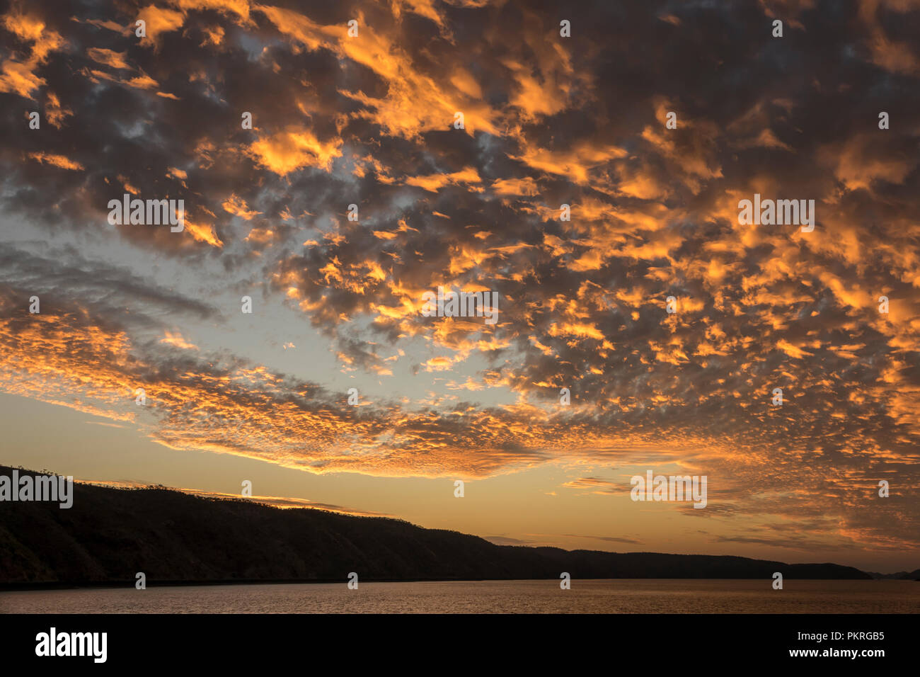 Altocumulus clouds at sunset, Talbot Bay, Western Australia Stock Photo ...