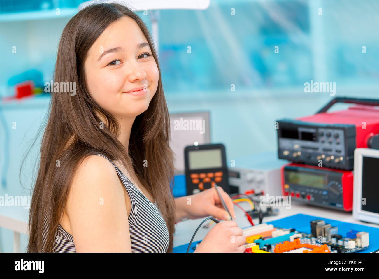 Girl in robotics laboratory Stock Photo - Alamy