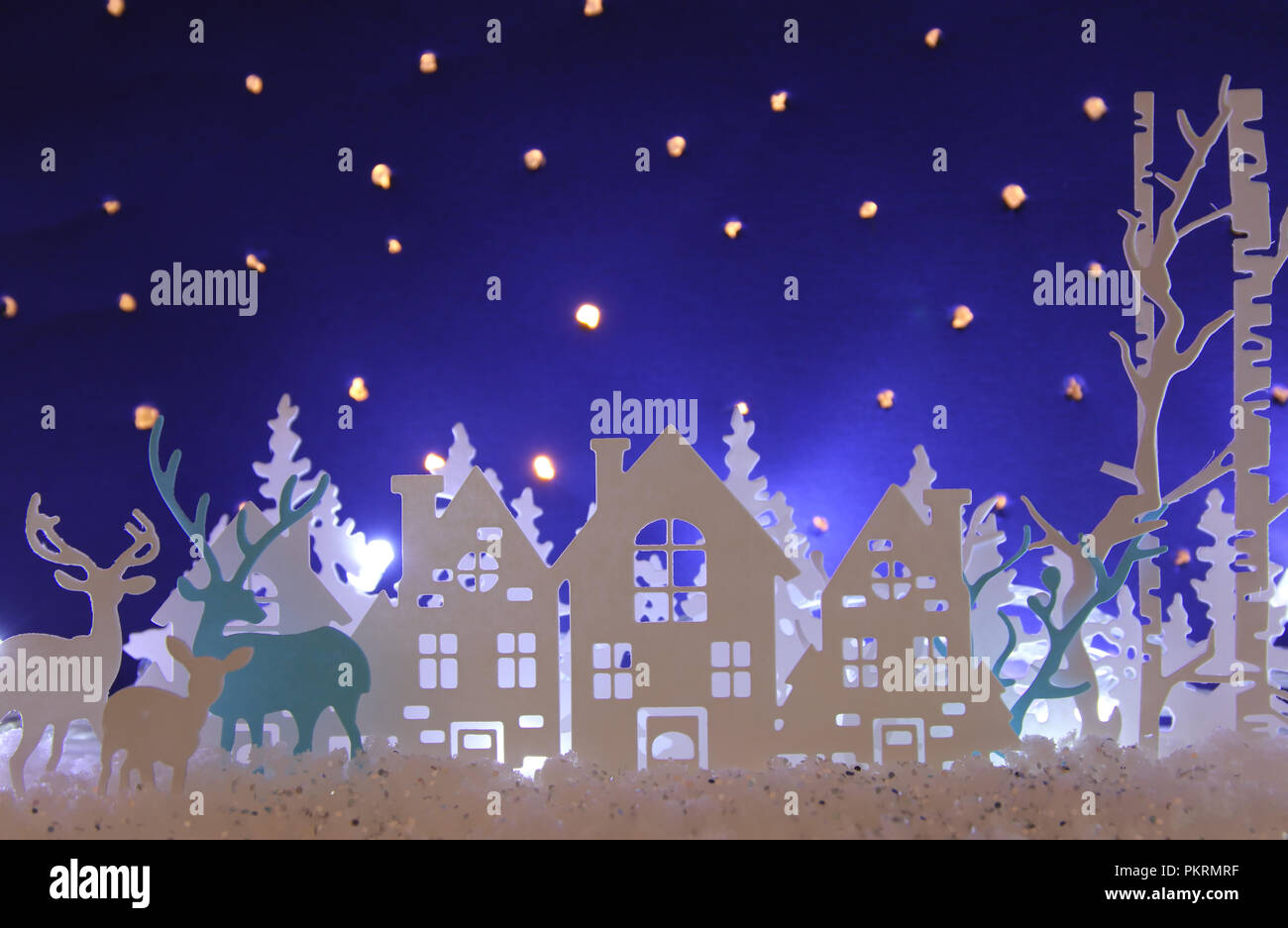 Magical Christmas paper cut winter background landscape with houses ...