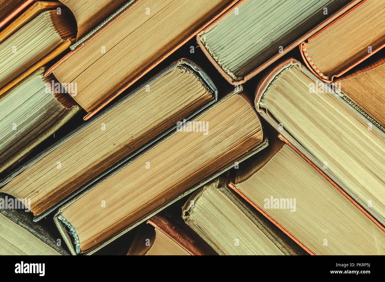 Stack of books background. many books piles Stock Photo - Alamy