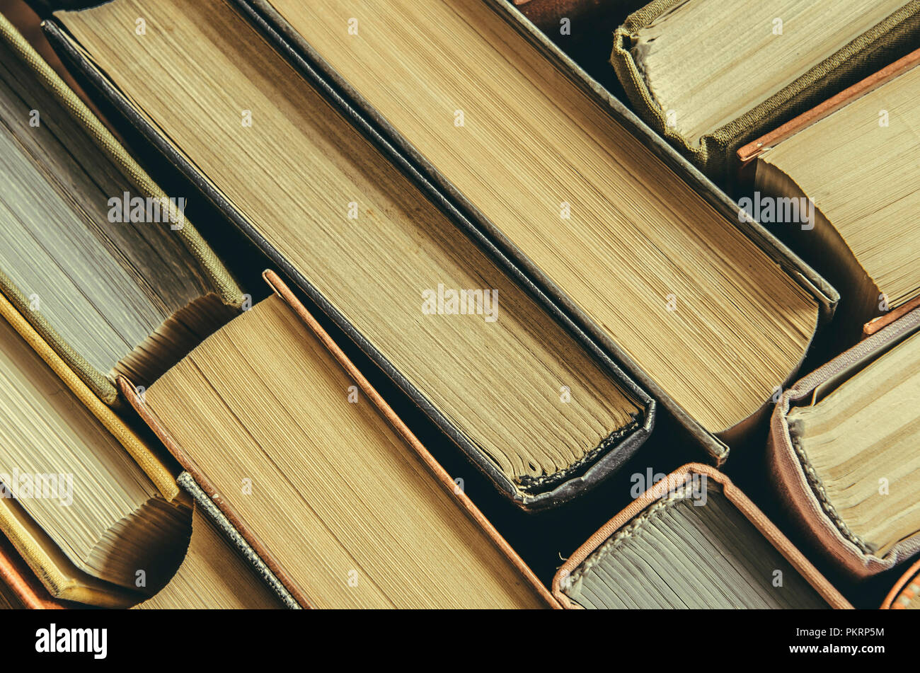 Stack of books background. many books piles Stock Photo - Alamy