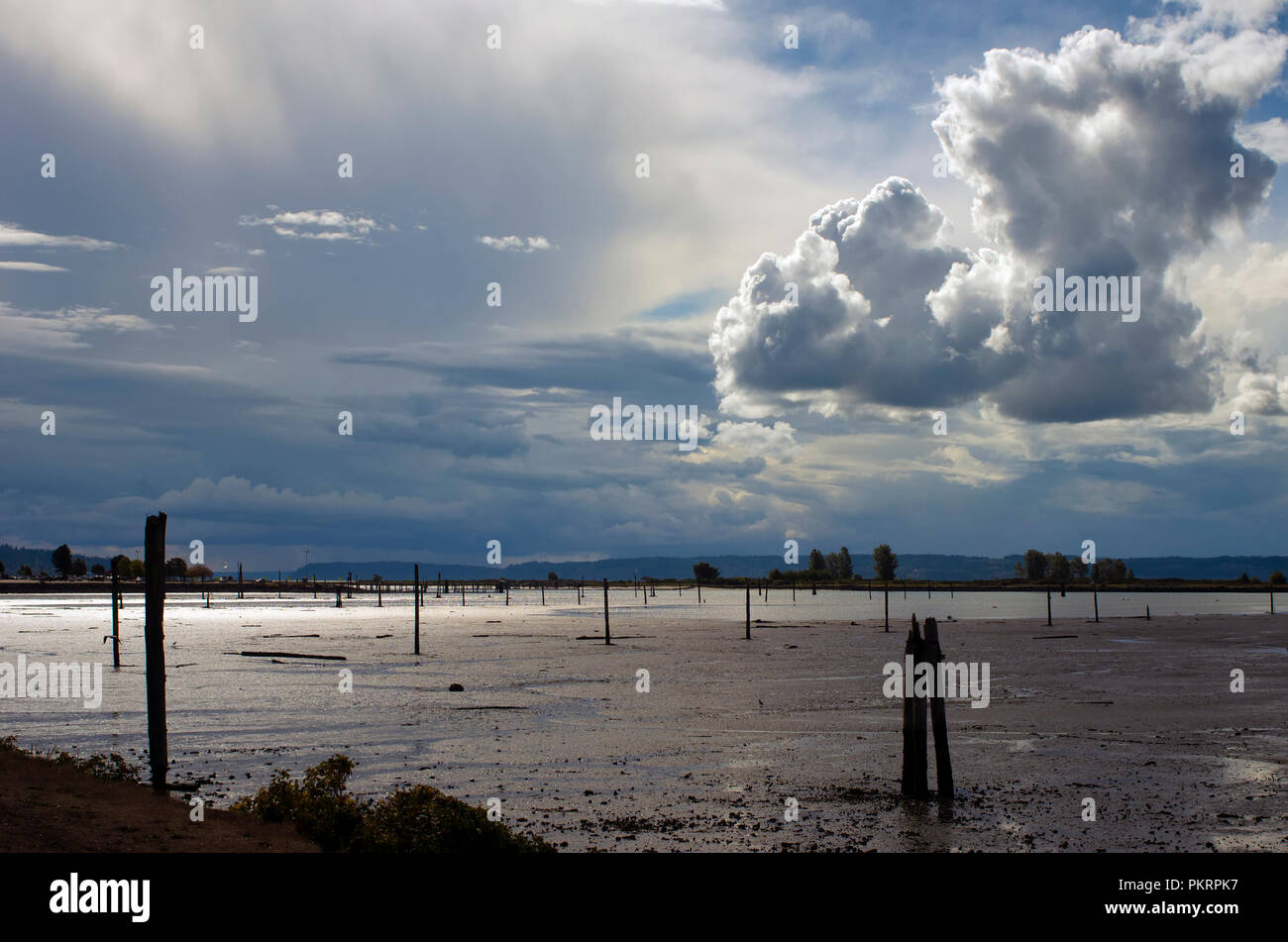 The sun and clouds create a dramatic backdrop looking west from the ...