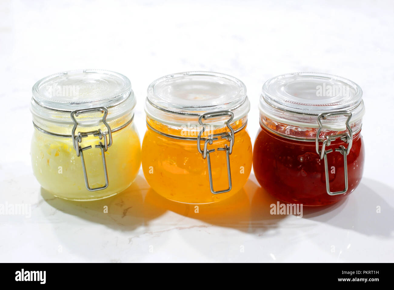 homemade jam and butter in jars on white table for breakfast Stock ...