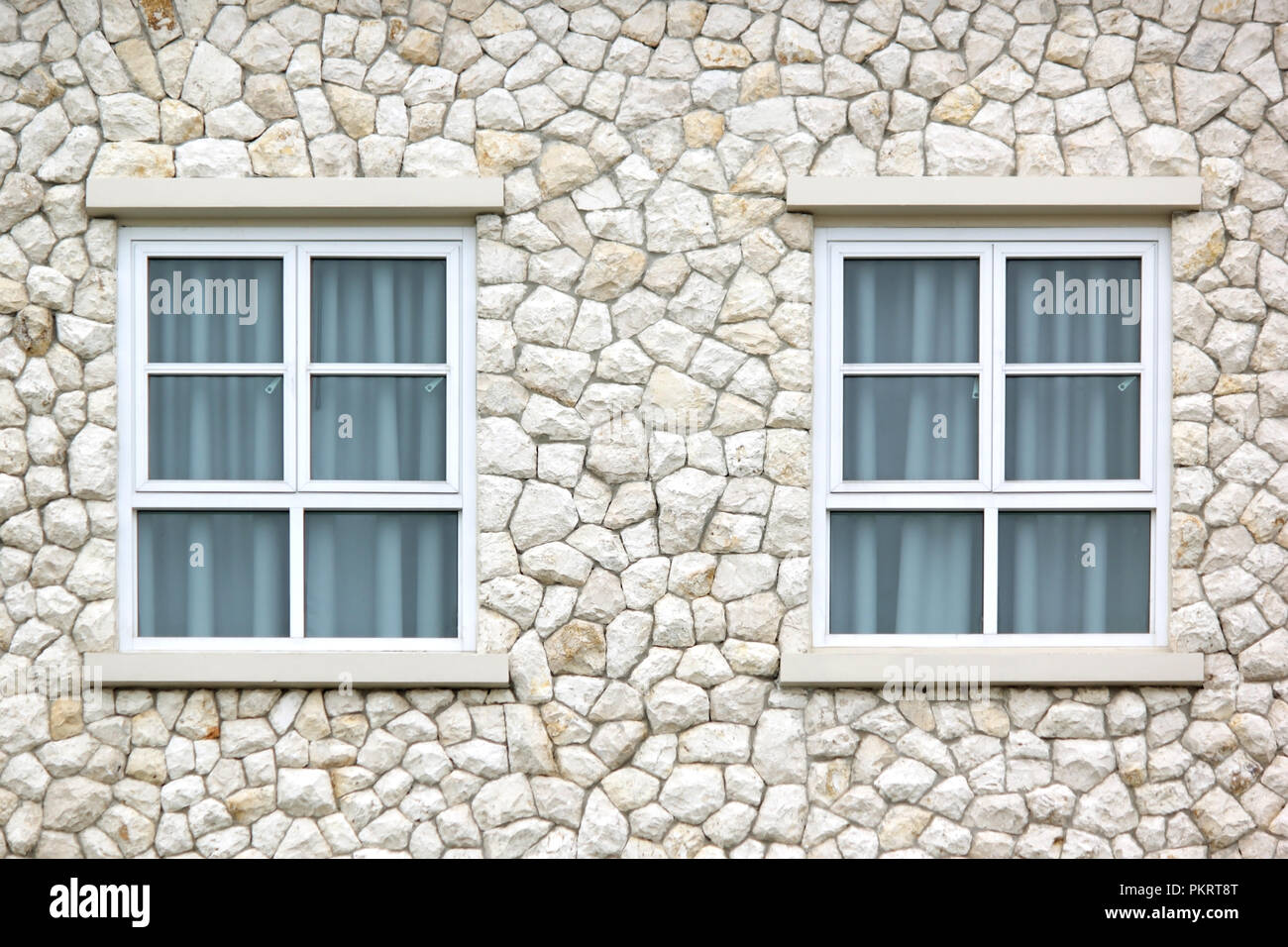 window with curtain on stone wall background Stock Photo - Alamy