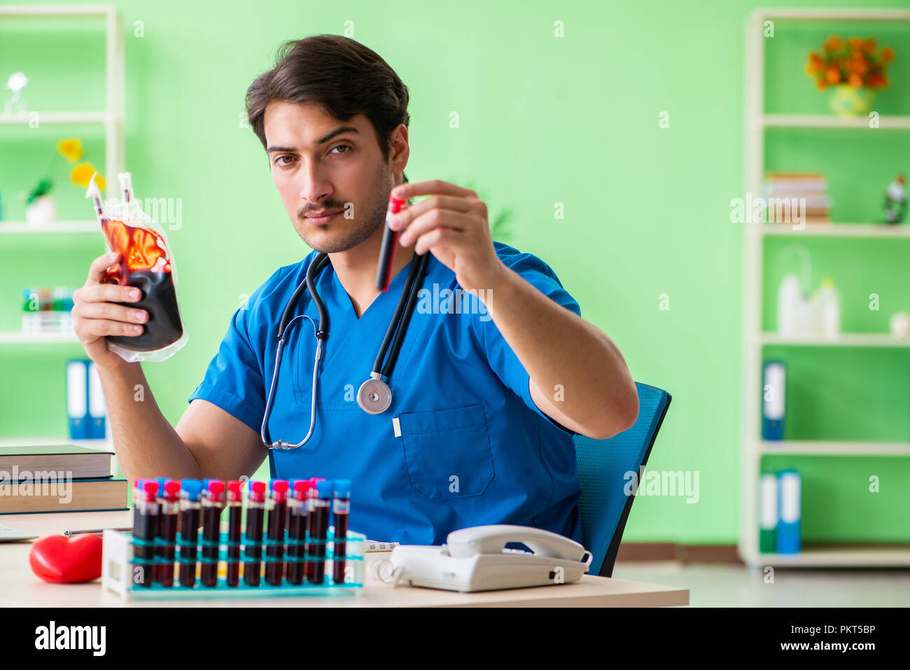 Doctor doing blood analysis in the lab Stock Photo - Alamy