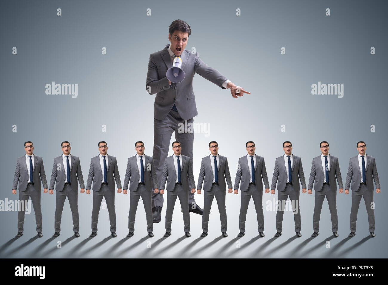 Concept of angry boss yelling with loudspeaker Stock Photo - Alamy