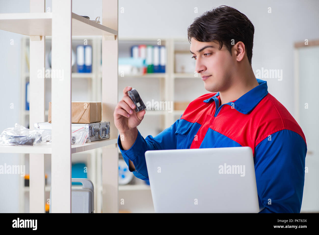 Man working in the postal warehouse Stock Photo - Alamy