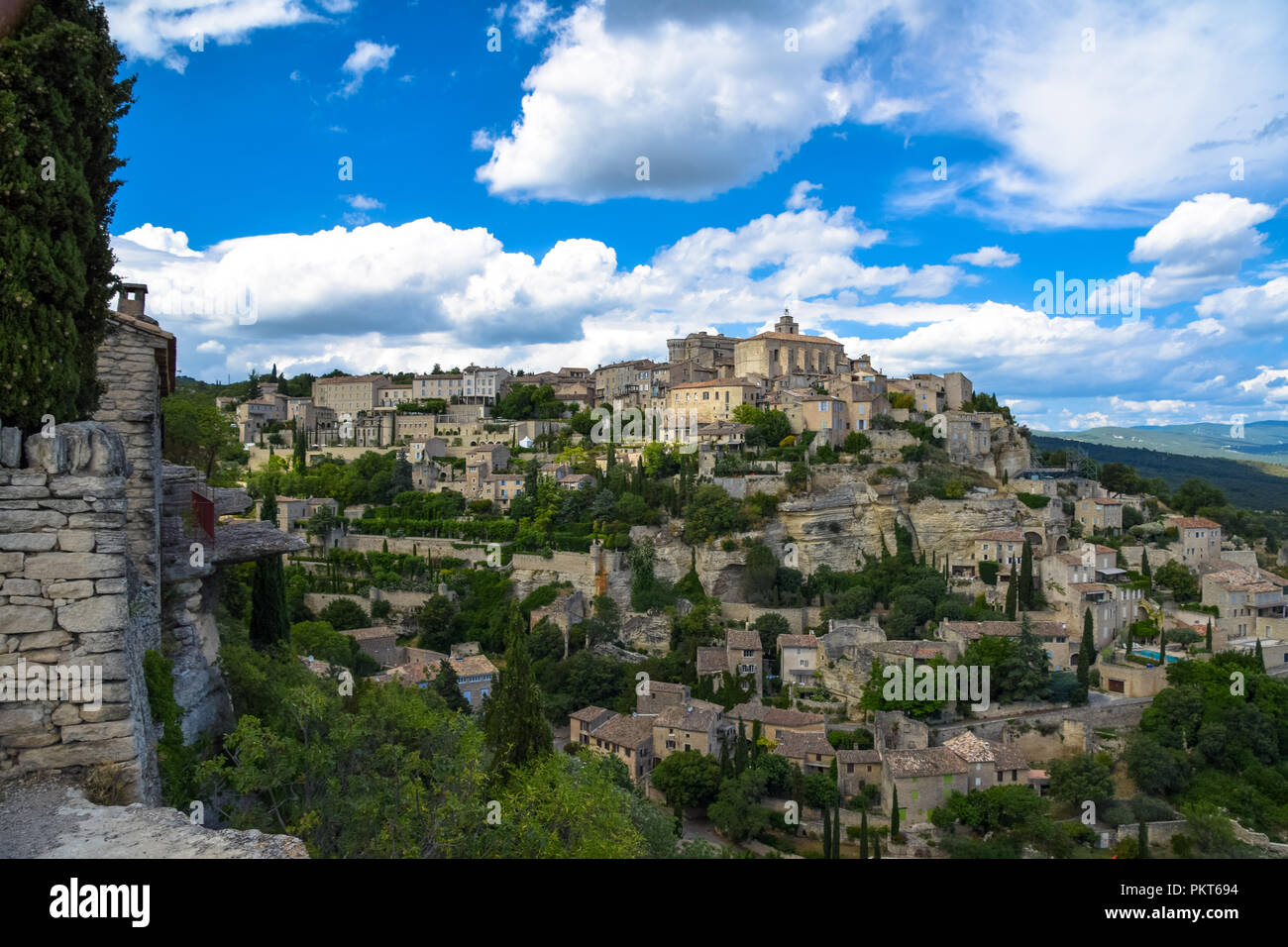 A view of the hilltop medieval village of Gordes in the Luberon area of ...