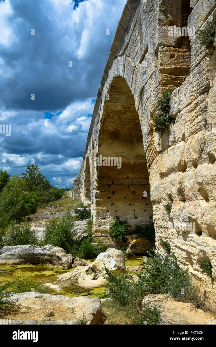 The Roman Bridge of Pont Julien, dating from 3 BC, near the village of ...