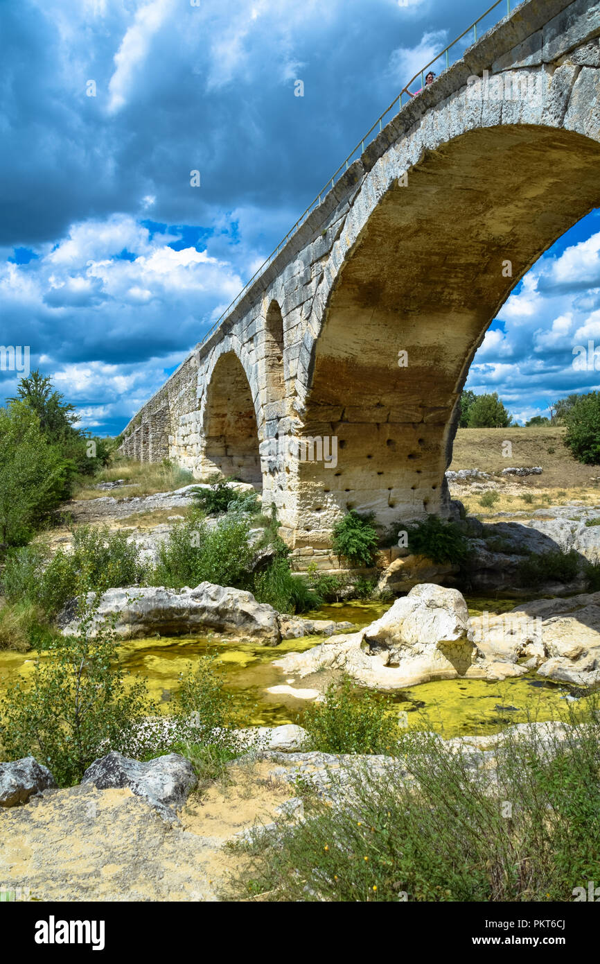 The Roman Bridge of Pont Julien, dating from 3 BC, near the village of ...
