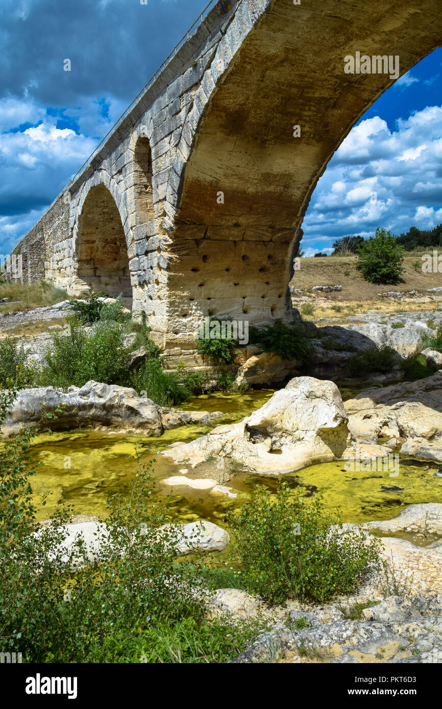 The Roman Bridge of Pont Julien, dating from 3 BC, near the village of ...