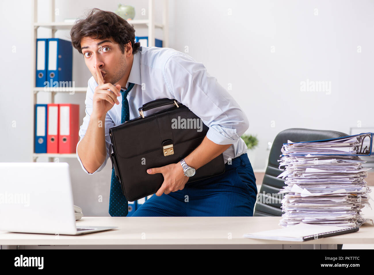 Overloaded busy employee with too much work and paperwork Stock Photo ...