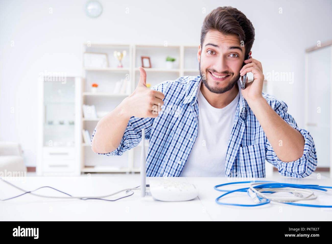 Man enjoying fast internet connection Stock Photo - Alamy