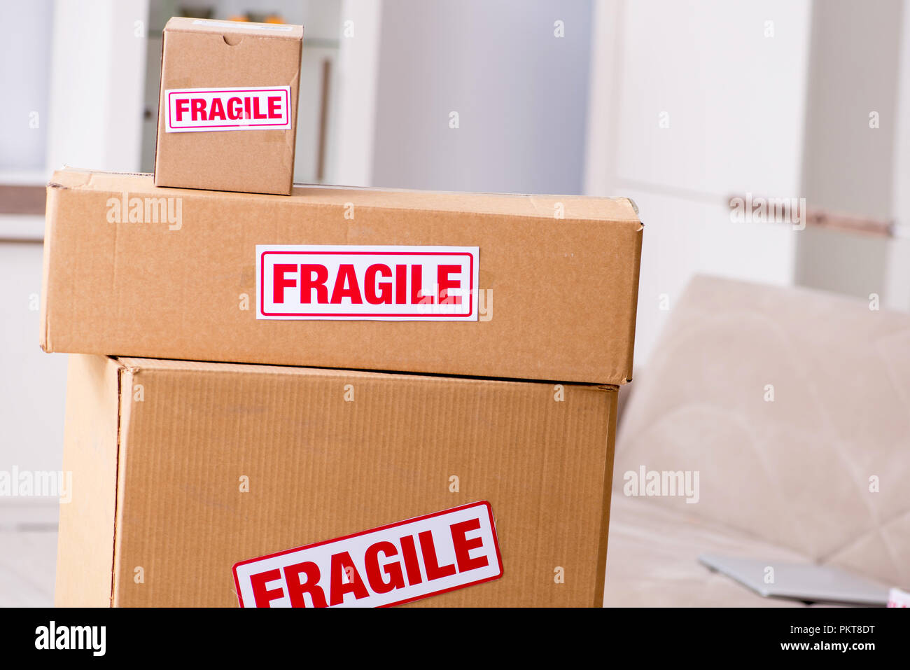 Transportation contractor with fragile boxes Stock Photo - Alamy