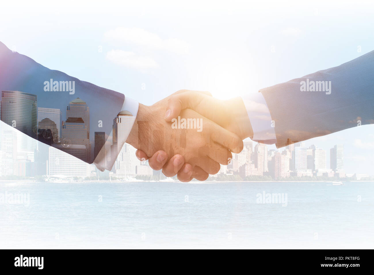 Concept of cooperation with handshake Stock Photo - Alamy