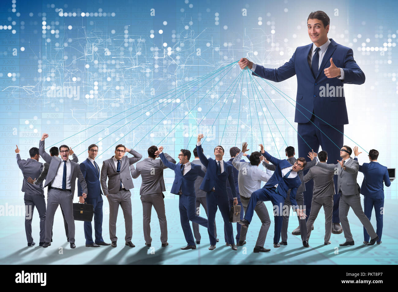 Boss employee manipulating his staff in business concept Stock Photo ...