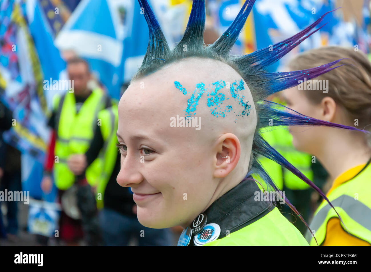 Glasgow, Scotland, UK. 15th September, 2018. A female steward with a ...