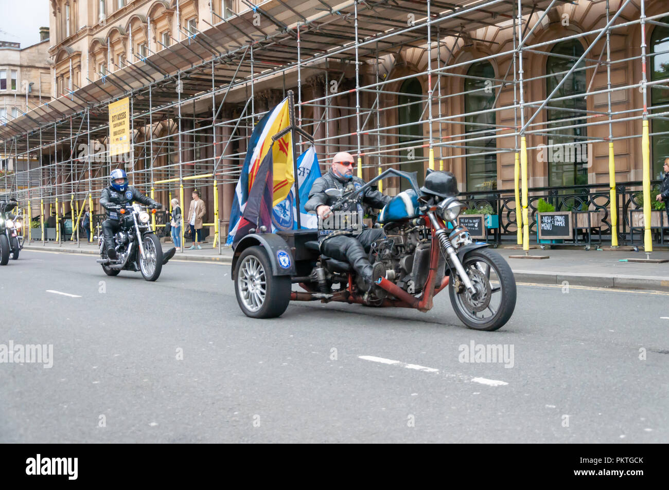 Glasgow, Scotland, UK. 15th September, 2018. A biker drives a trike ...