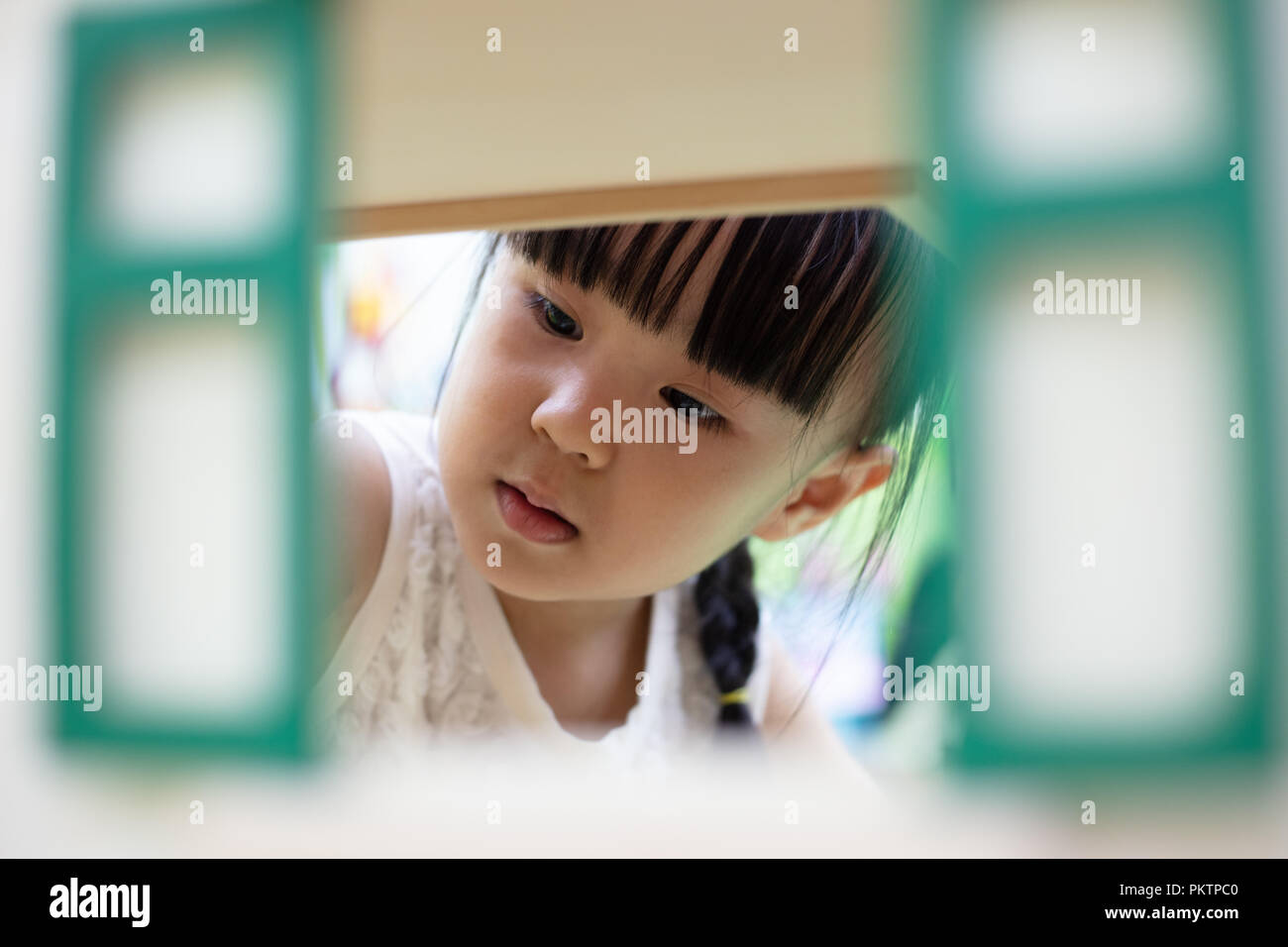 Asian Chinese little girl playing at indoor playground Stock Photo - Alamy