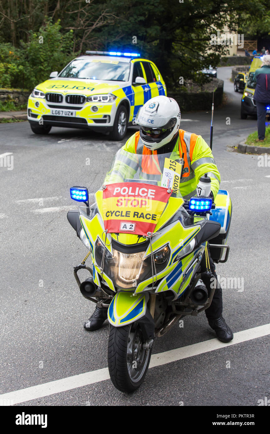 Policing the tour of Britain bike race passing through Clappersgate ...
