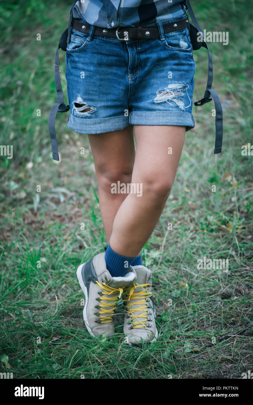 Young woman reading map in mountain Stock Photo - Alamy