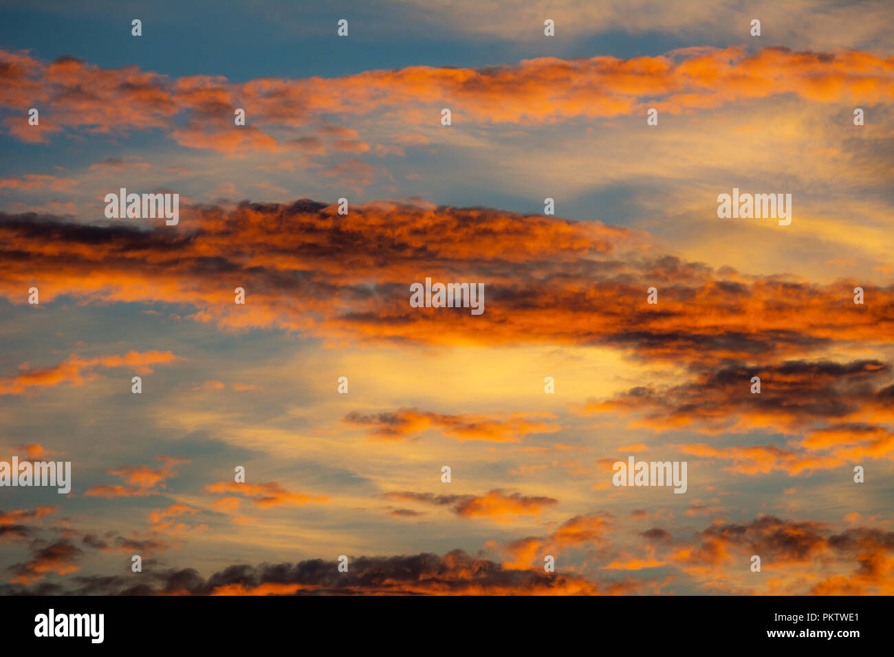 Colorful afterglow sky background with clouds Stock Photo - Alamy