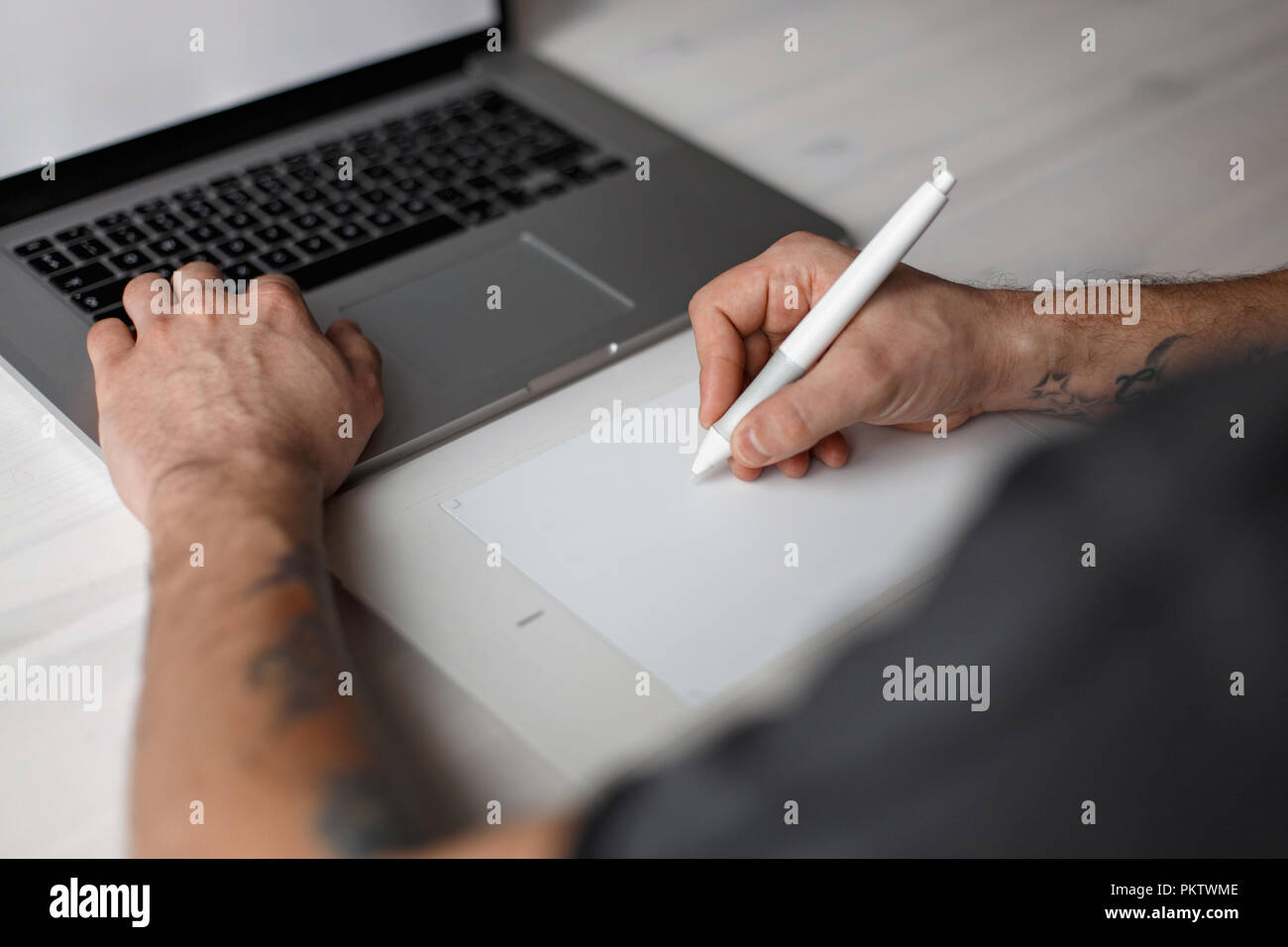 Young man draws hi-res stock photography and images - Alamy