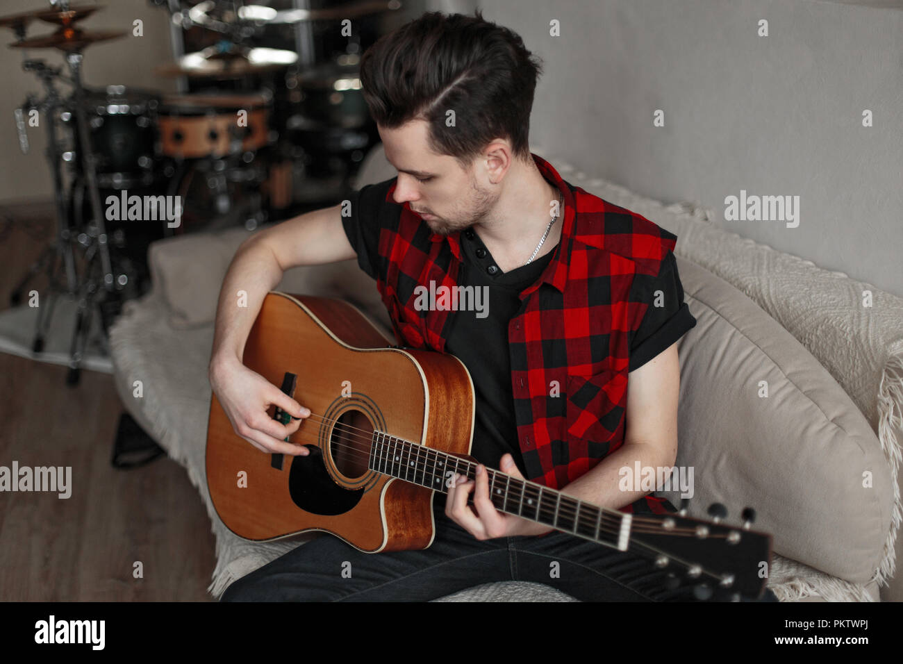 Practicing guitar hi-res stock photography and images - Alamy