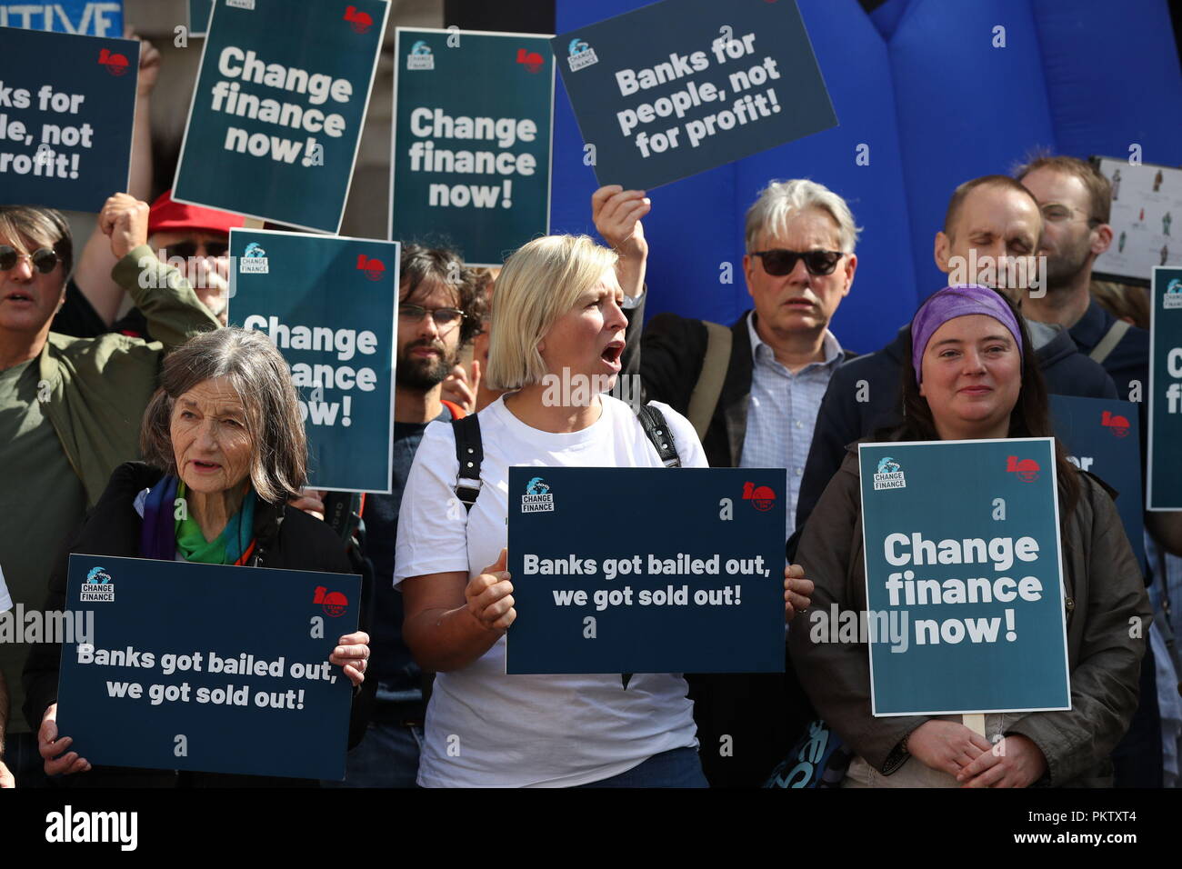 Protesters calling for banking reform at a rally to mark the 10th ...